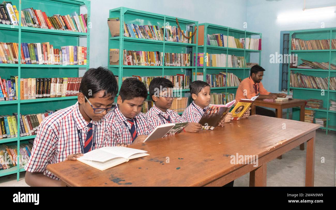 Student reading in school library stock photos Stock Photo - Alamy