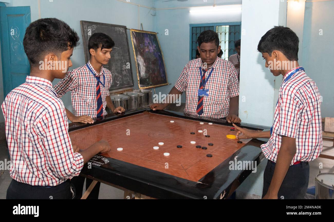 Indian boy playing board game hi-res stock photography and images - Alamy