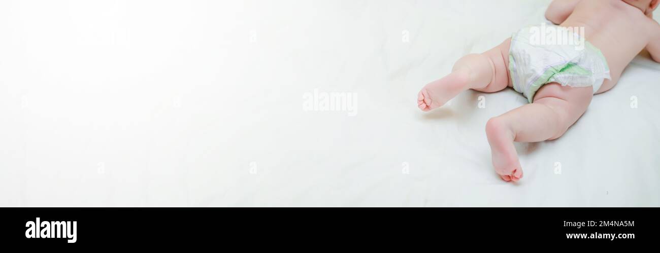 The legs of a newborn baby. Baby pink baby legs that learn to crawl in ...