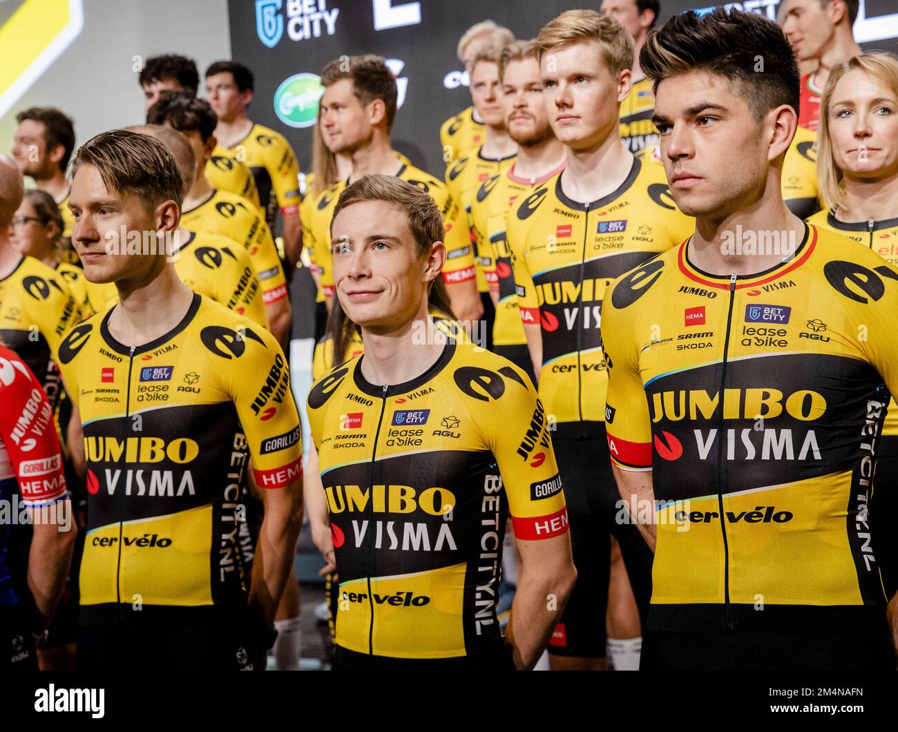 AMSTERDAM - Wilco Kelderman, Jonas Vingegaard and Wout van Aert (VLNR) during the team ...