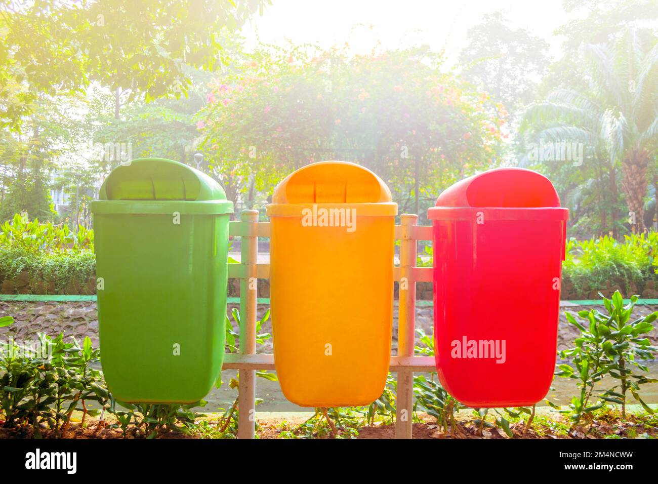 A clean and empty garbage bin in the park Stock Photo - Alamy