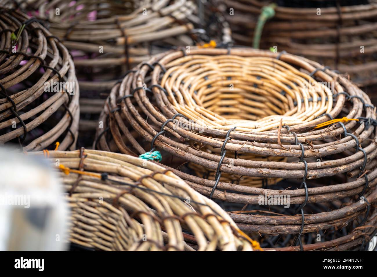 crayfish traps on a fishing boat. lobster wooden pots on the back of a ...