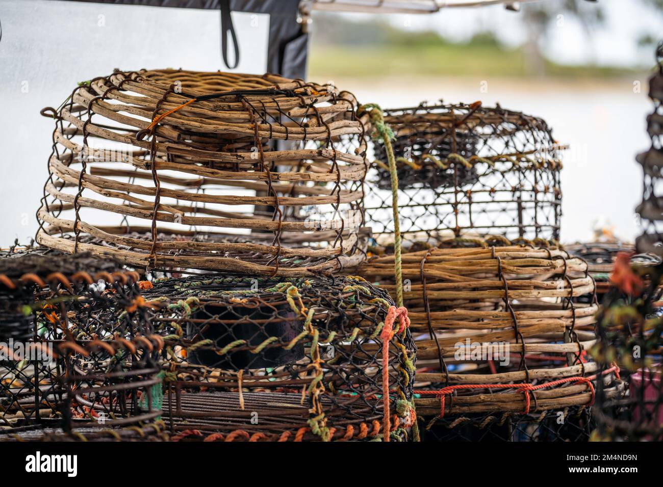 crayfish traps on a fishing boat. lobster wooden pots on the back of a ...