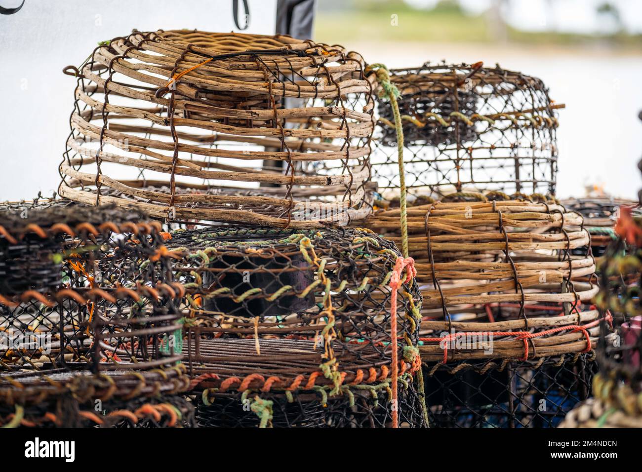 crayfish traps on a fishing boat. lobster wooden pots on the back of a ...