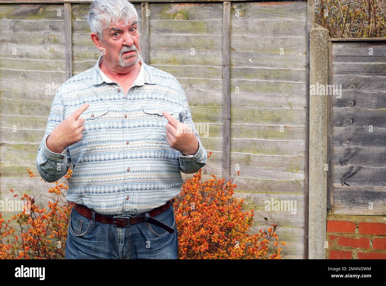 Angry senior or old man pointing at himself saying it wasn't me Stock ...