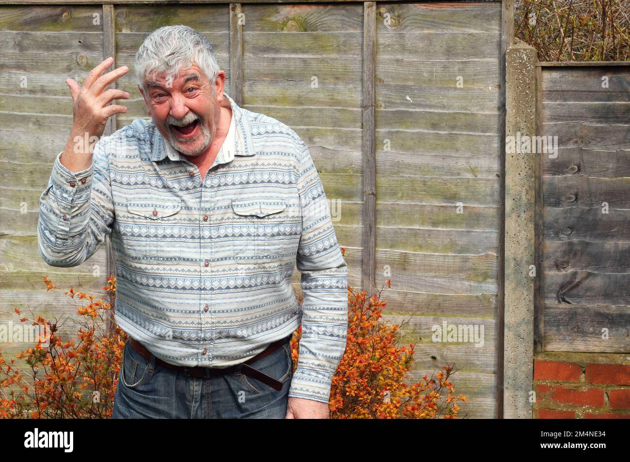 Senior or old man waving hand and saying come here. Come this way Stock ...