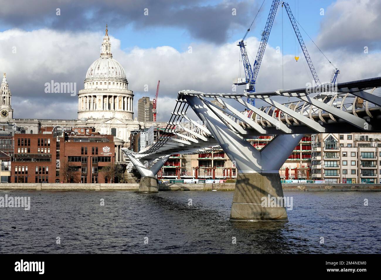Millennial bridge over River Thames leading to St Pauls, London Stock ...