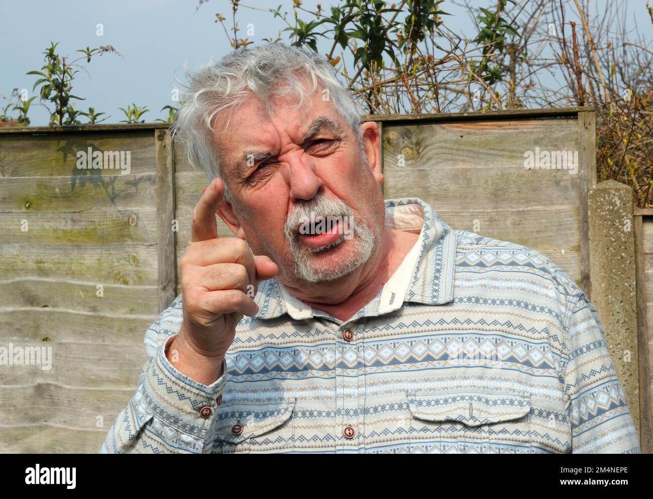 Angry elderly or old man. pointing and shouting Stock Photo - Alamy