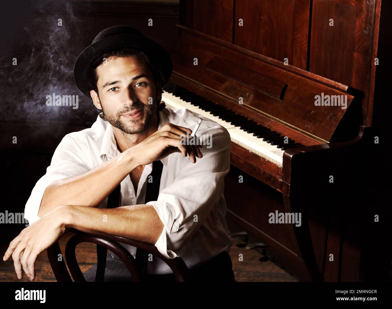 Creativity comes easy to this musician. Portrait of a young musician ...