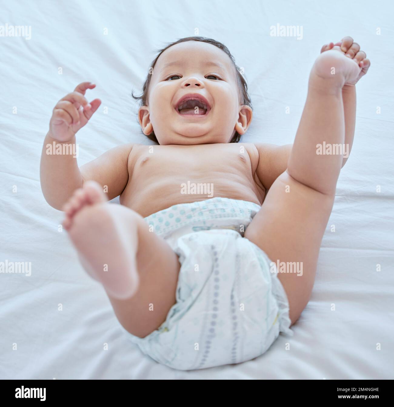 Mom, why do you look so tired. an adorable little girl lying alone on a ...