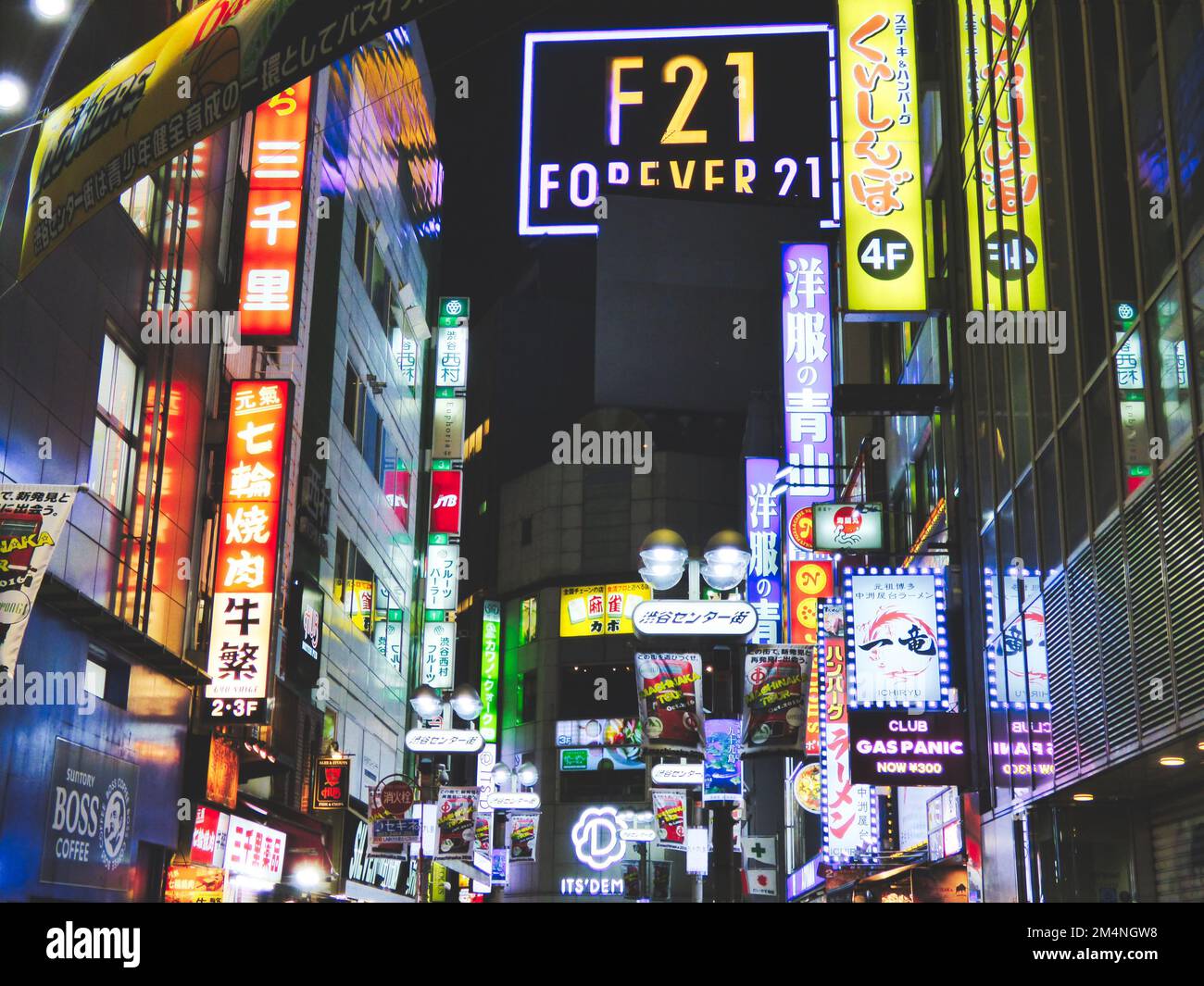 A low angle view of Neon lights and signs from the Shibuya district ...