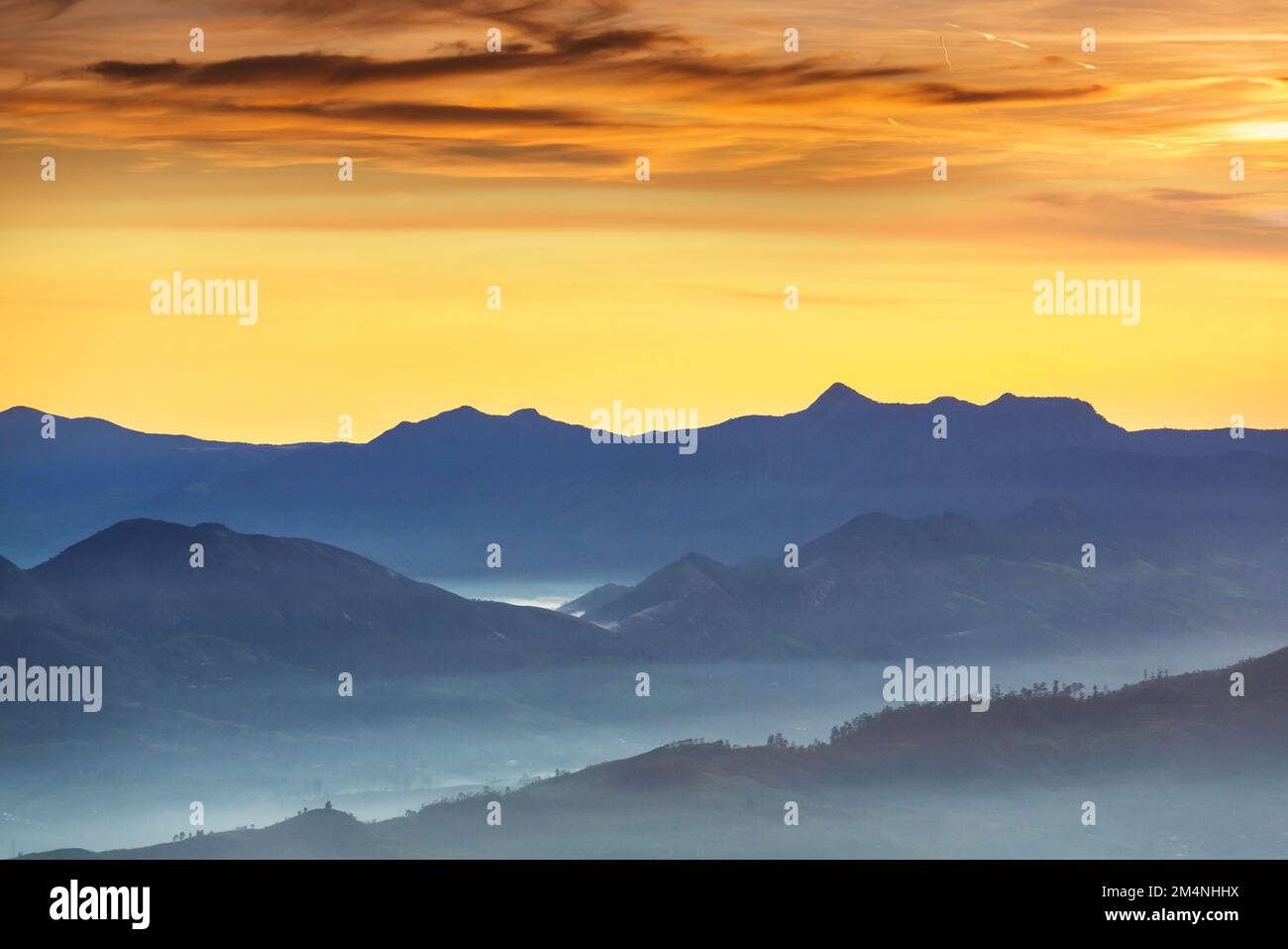 mountain silhouette at sunrise in spring season Stock Photo - Alamy