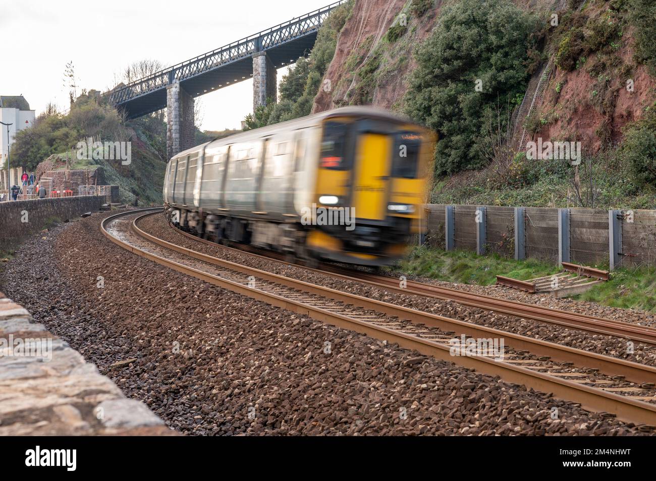 Locomotive train moving fast at Teignmouth blurred movement Stock Photo ...