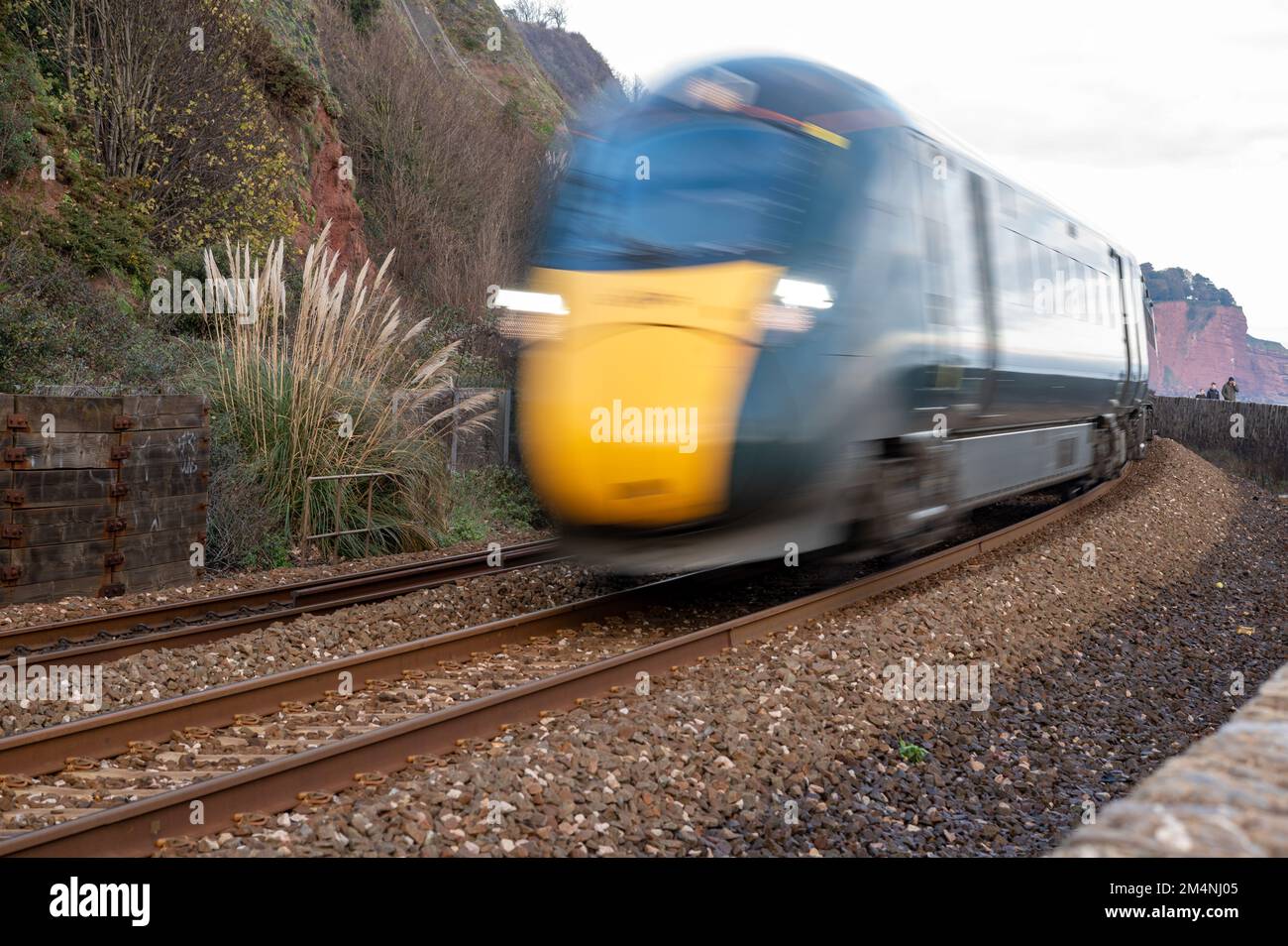 Locomotive train moving fast at Teignmouth blurred movement Stock Photo ...