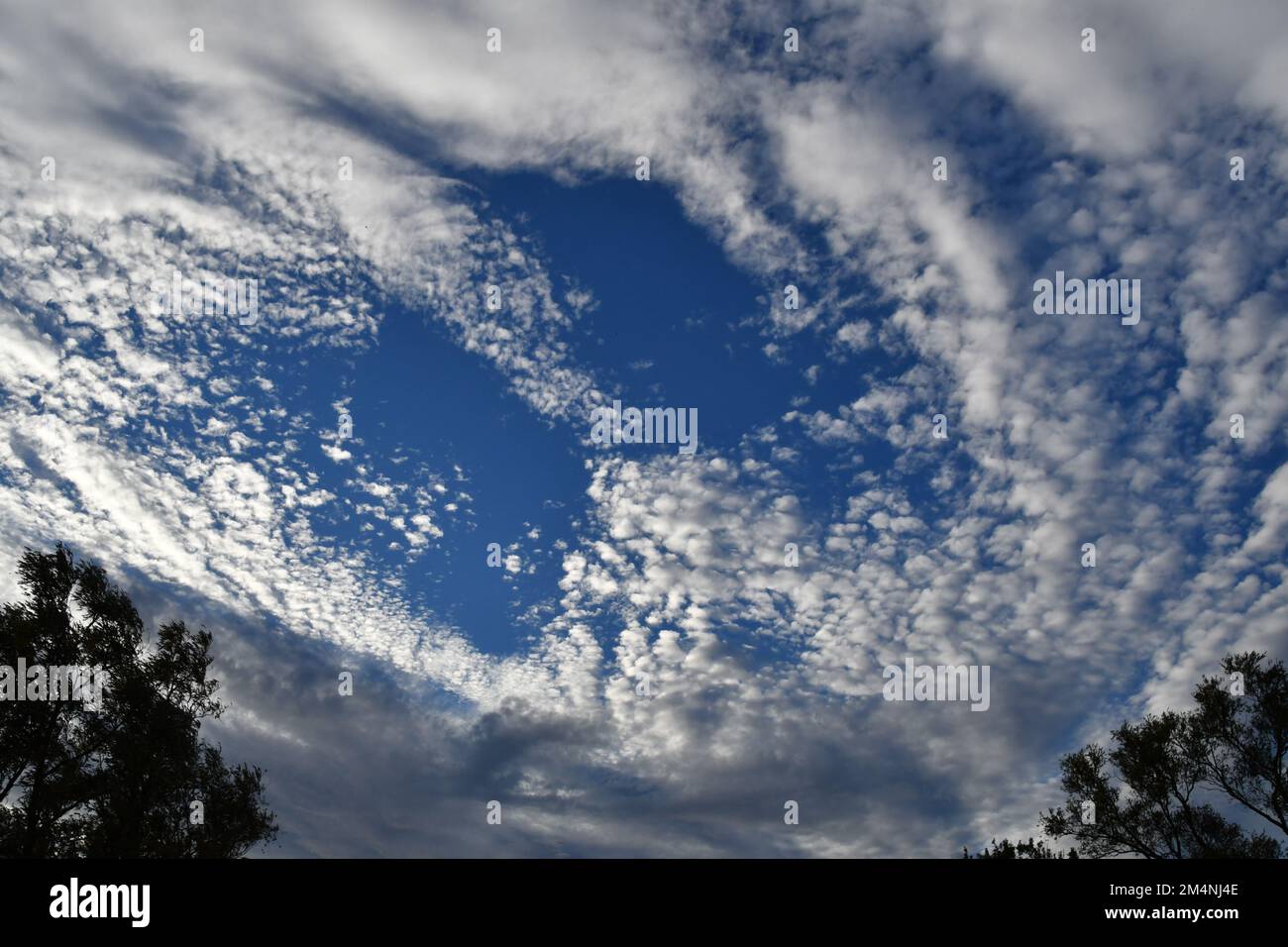 the clouds play and form patterns in the sky Stock Photo - Alamy