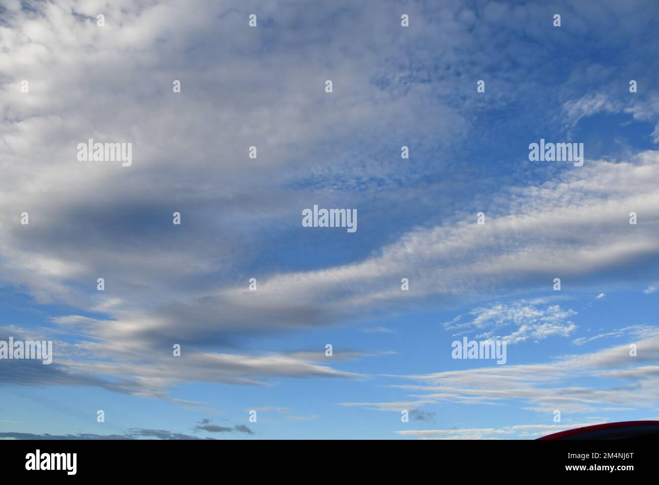 the clouds play and form patterns in the sky Stock Photo - Alamy