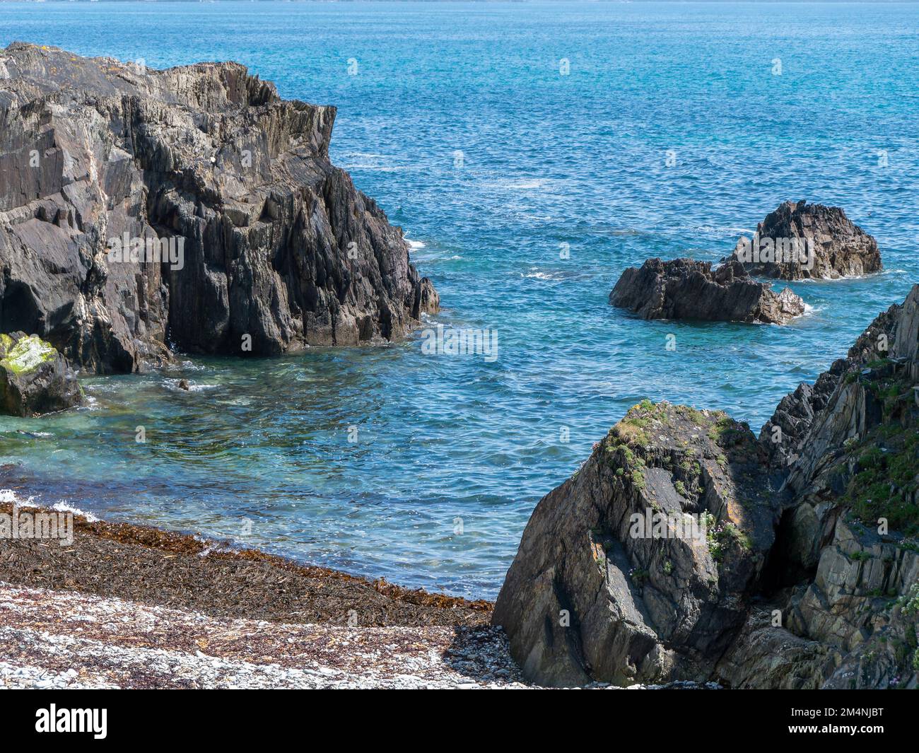 The rocky coast of the Atlantic Ocean on a sunny spring day. Seaside ...