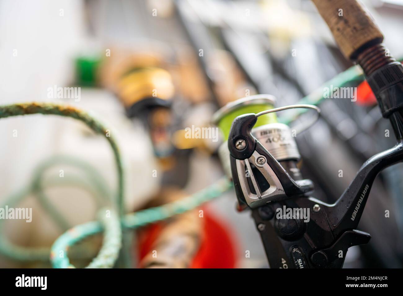 fishing rods on a fishing boat in tasmania australia Stock Photo - Alamy