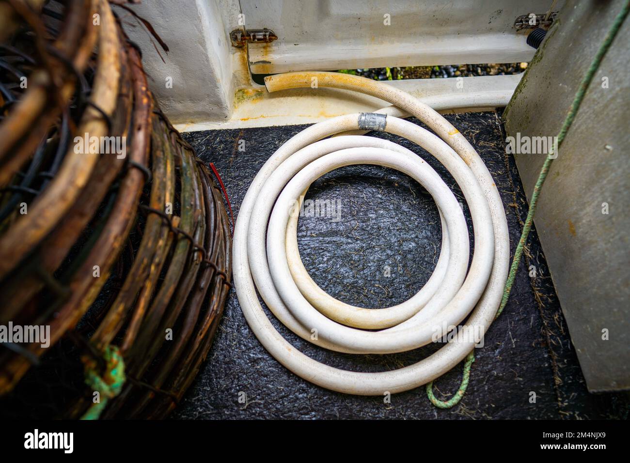 fishing boat white water hose on a crayfish boat in australia Stock ...