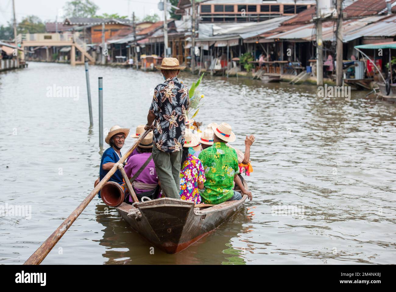 Traditional People on a woodboat at the Floating Market at the Klong ...