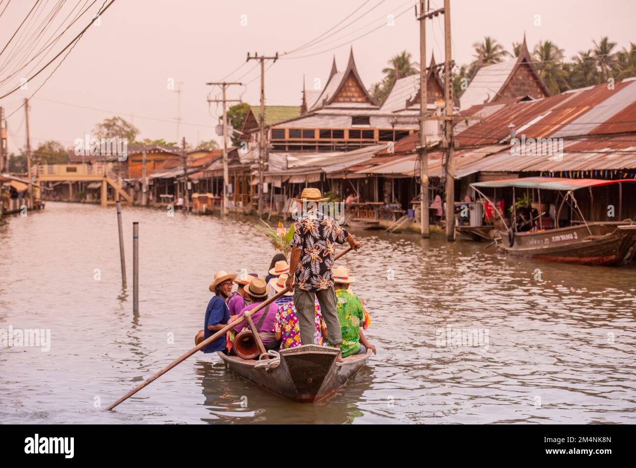 Traditional People on a woodboat at the Floating Market at the Klong ...