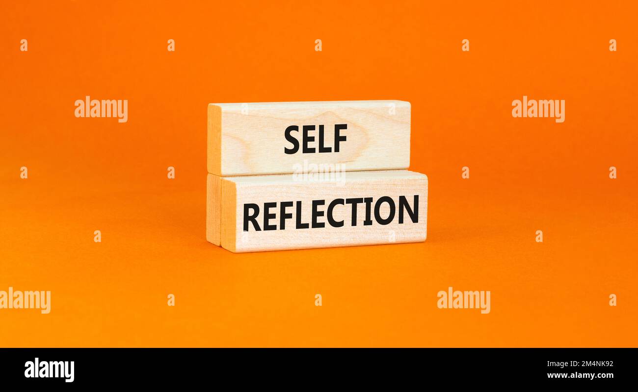 Self reflection symbol. Concept word Self reflection typed on wooden ...