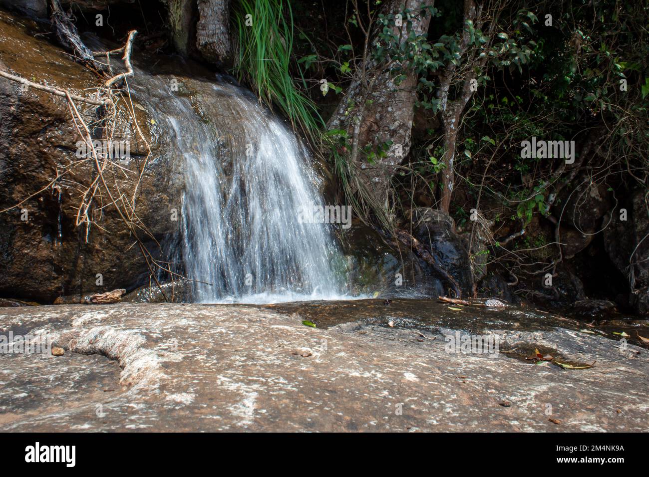 A mini waterfall of a stream in the forest area of Kolli Hills located ...
