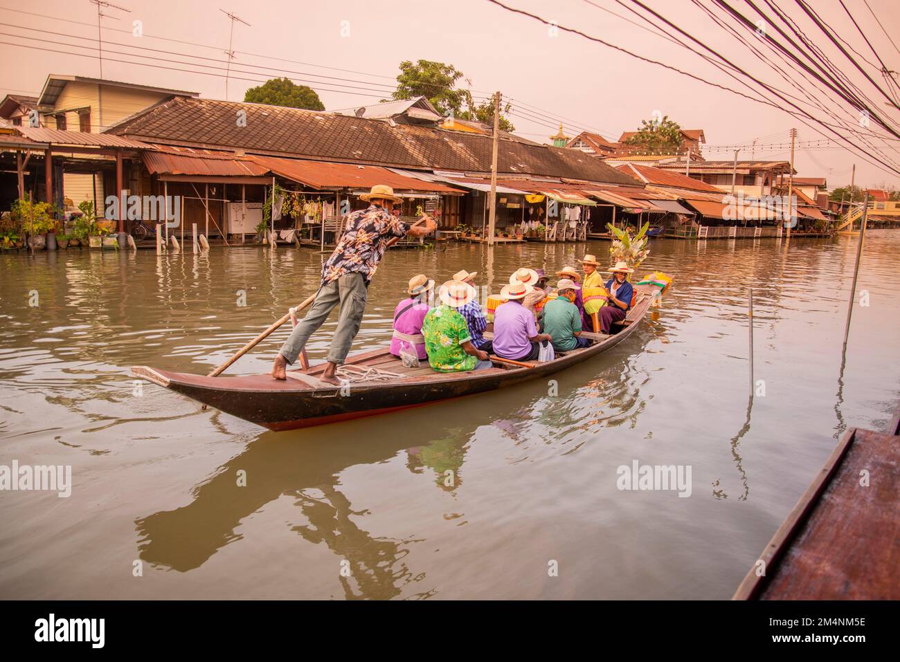 Traditional People on a woodboat at the Floating Market at the Klong ...