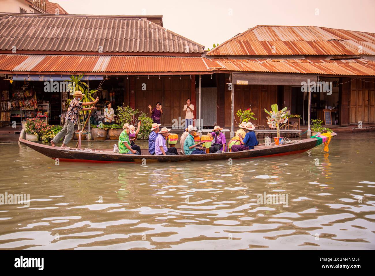 Traditional People on a woodboat at the Floating Market at the Klong ...