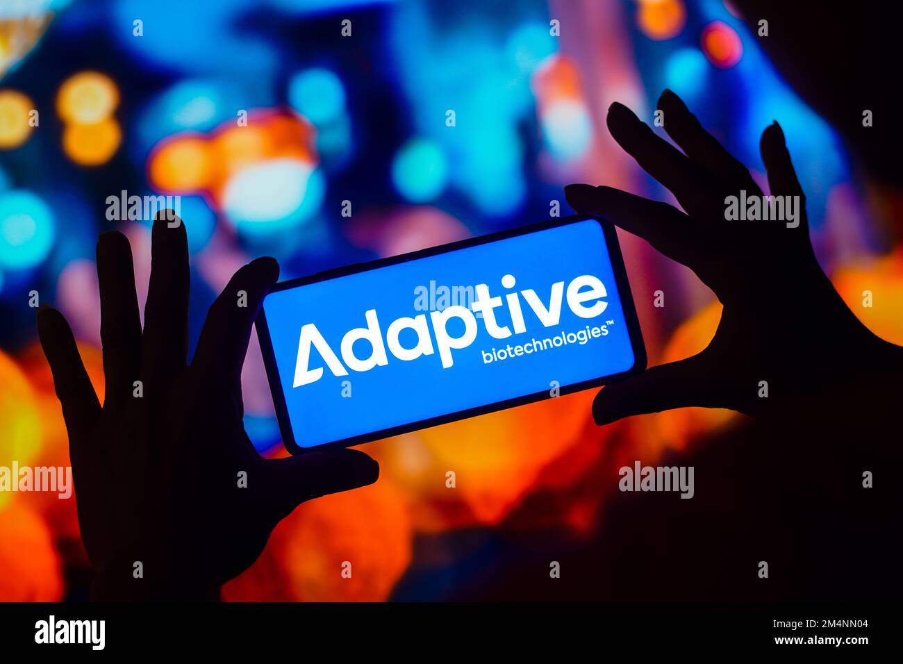 In this photo illustration, the Adaptive Biotechnologies logo is ...