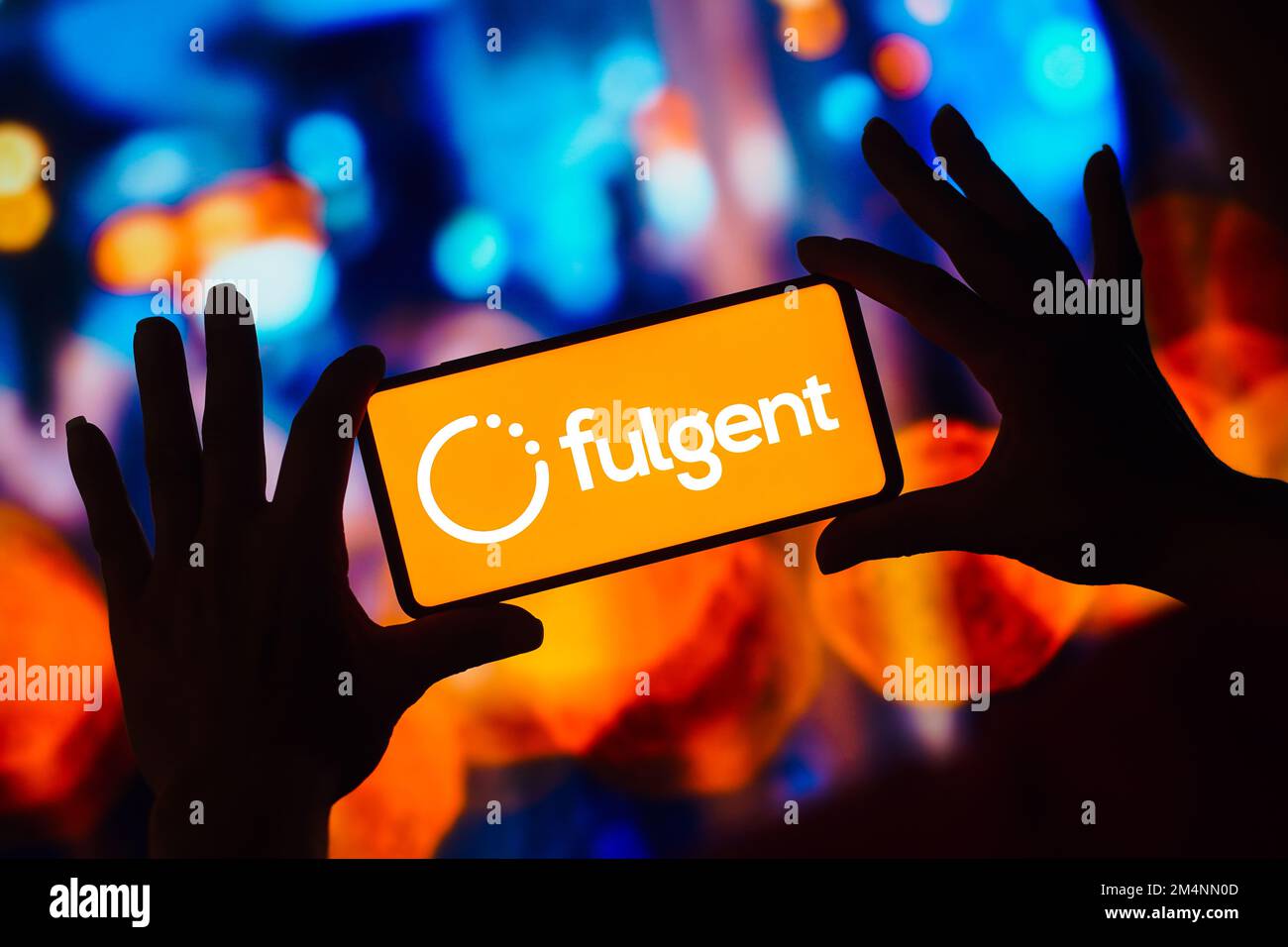 In this photo illustration, the Fulgent Genetics logo is displayed on a ...