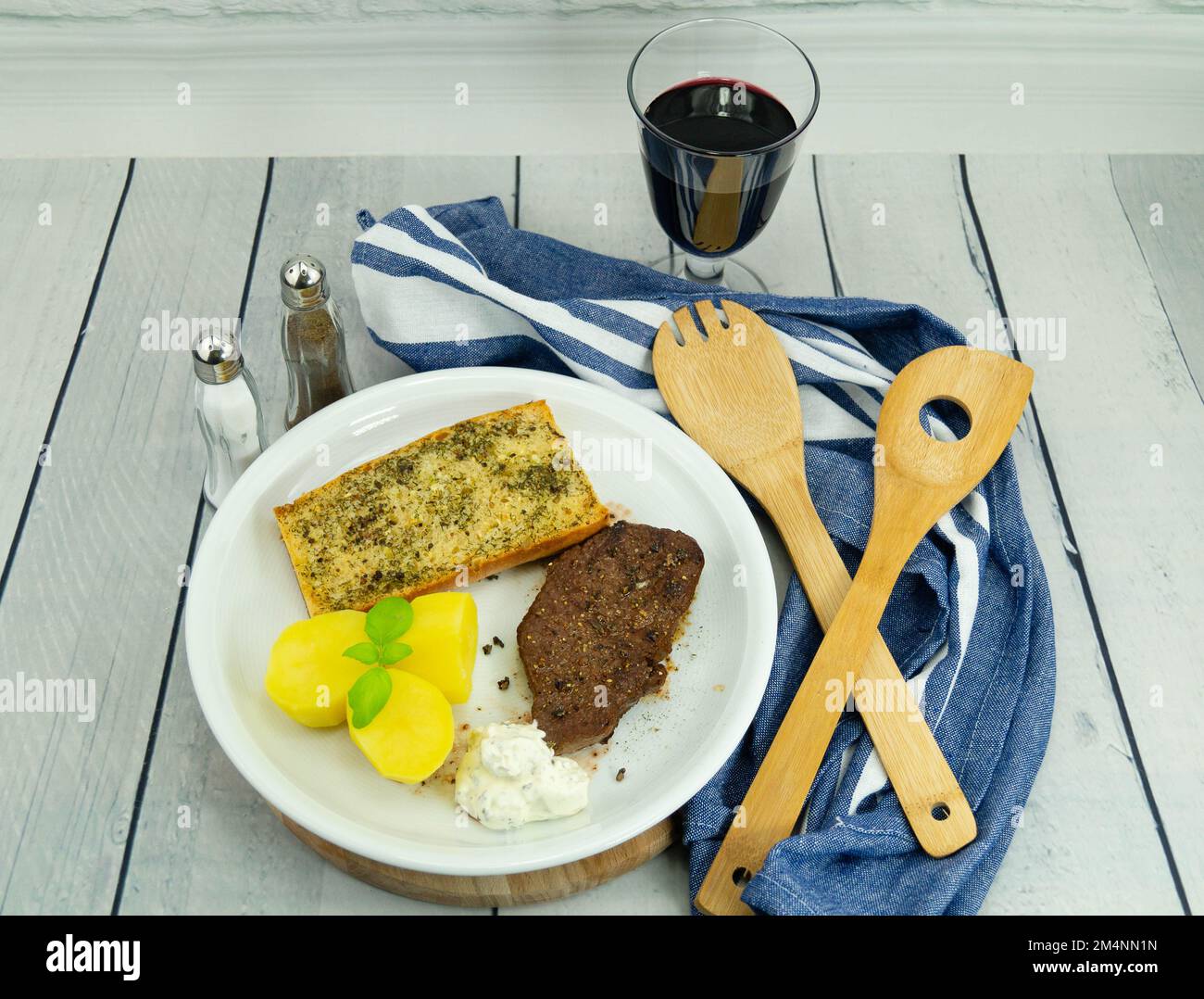 a freshly fried beef steak from the frying pan with delicious ...