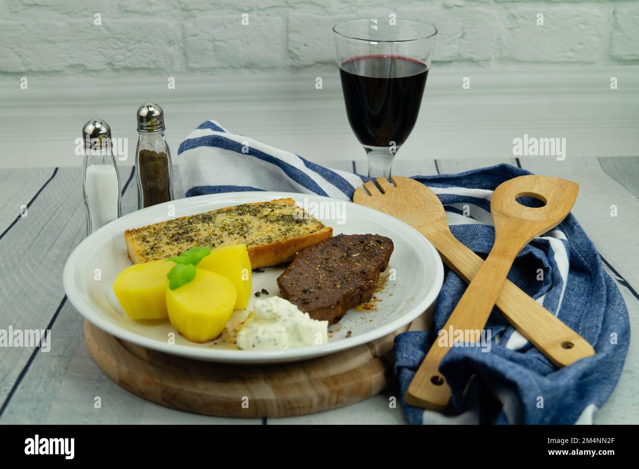 a freshly fried beef steak from the frying pan with delicious ...