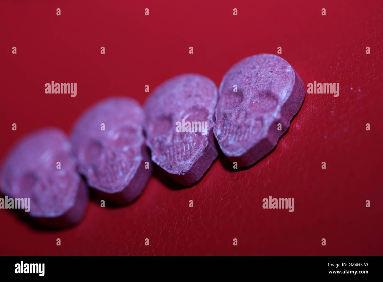 Pink skull ecstasy pill close up background high quality prints purple ...