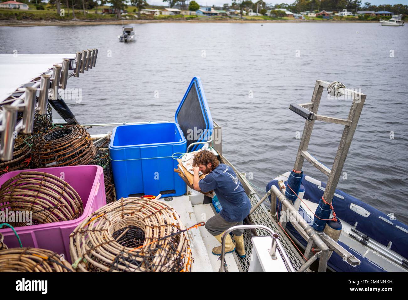 fishing boats with cray pots in australia Stock Photo - Alamy