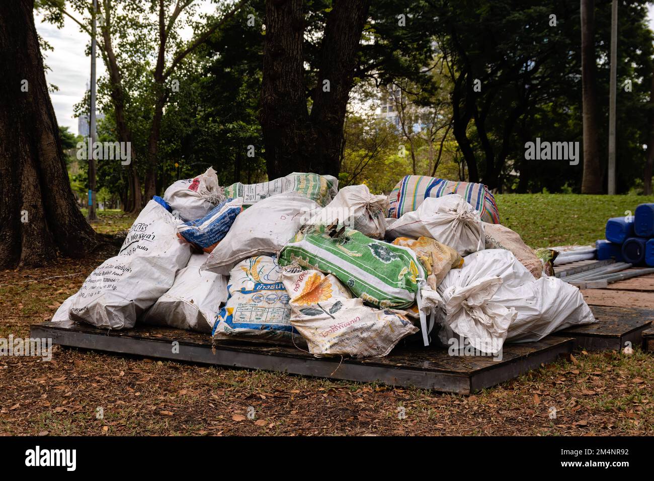 Bangkok, Thailand. November 14, 2022. Pile of white garbage bags in ...