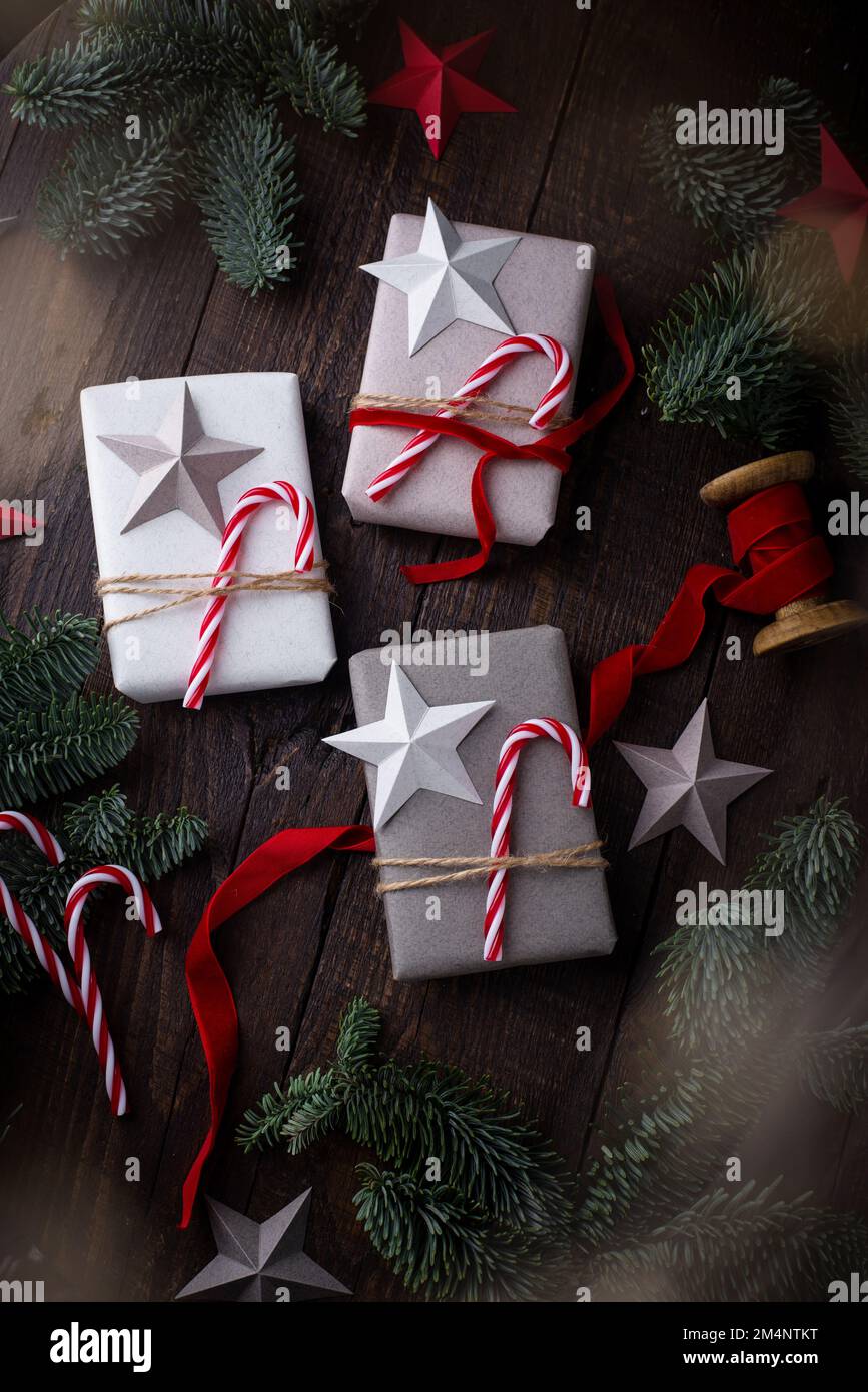 Christmas gift box with candy and star Stock Photo - Alamy