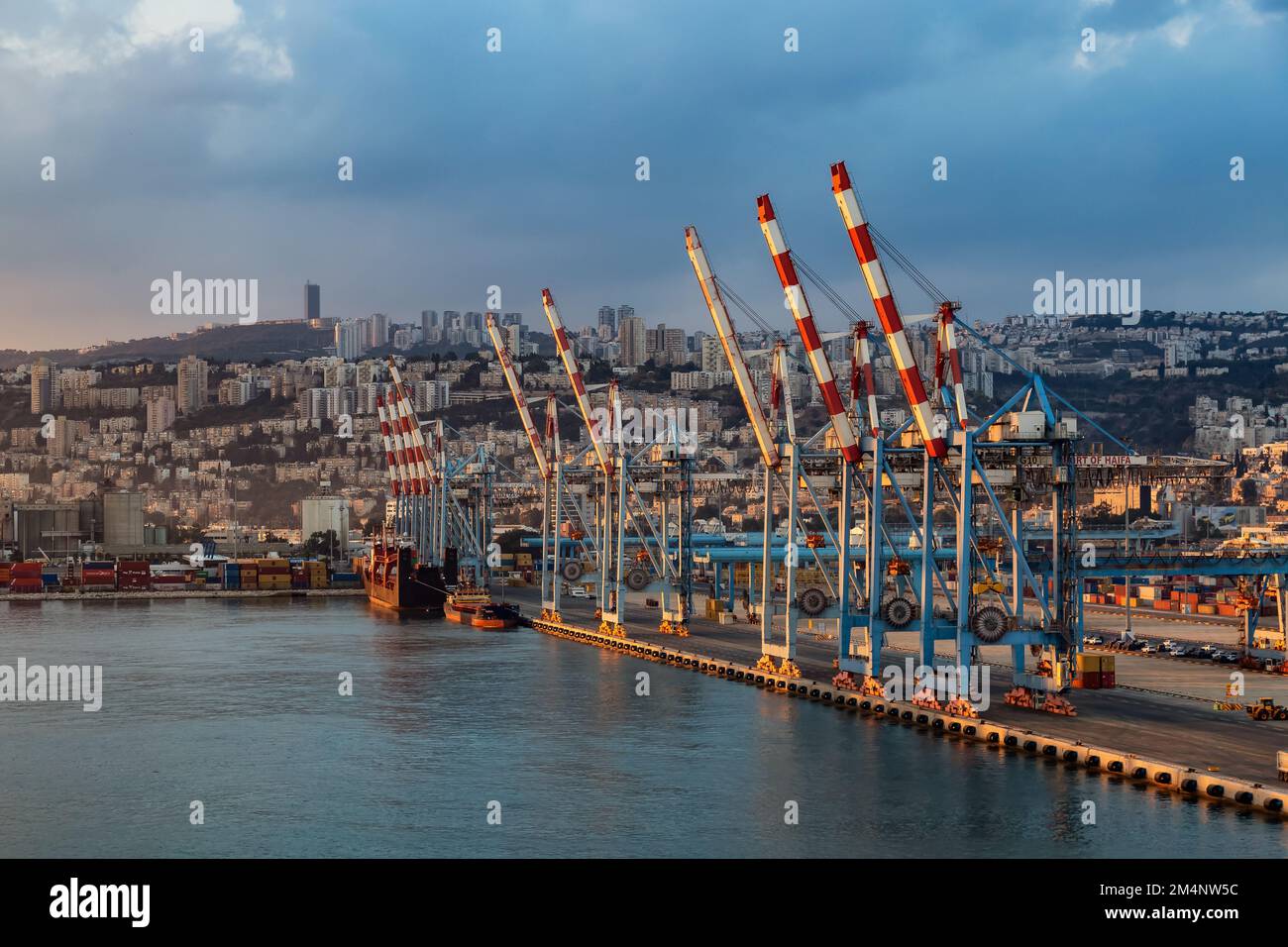 Port of Haifa during dramatic sunrise. View from cruise ship Stock ...