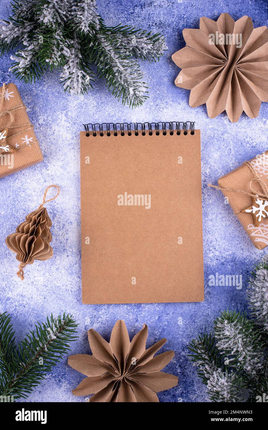Christmas composition with empty craft notebook Stock Photo - Alamy