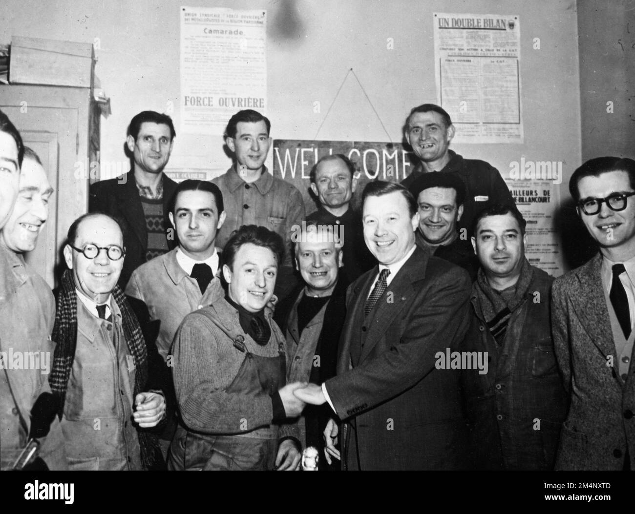 Guy Nunn and Walter Reuther Study a Special Edition of "Force Ouvriere ...