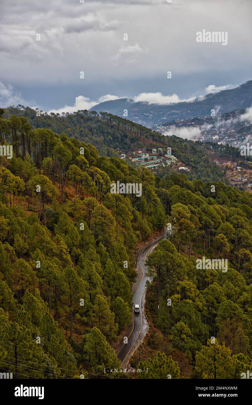 An aerial view of a pathway in forests in Murree Expressway Stock Photo ...