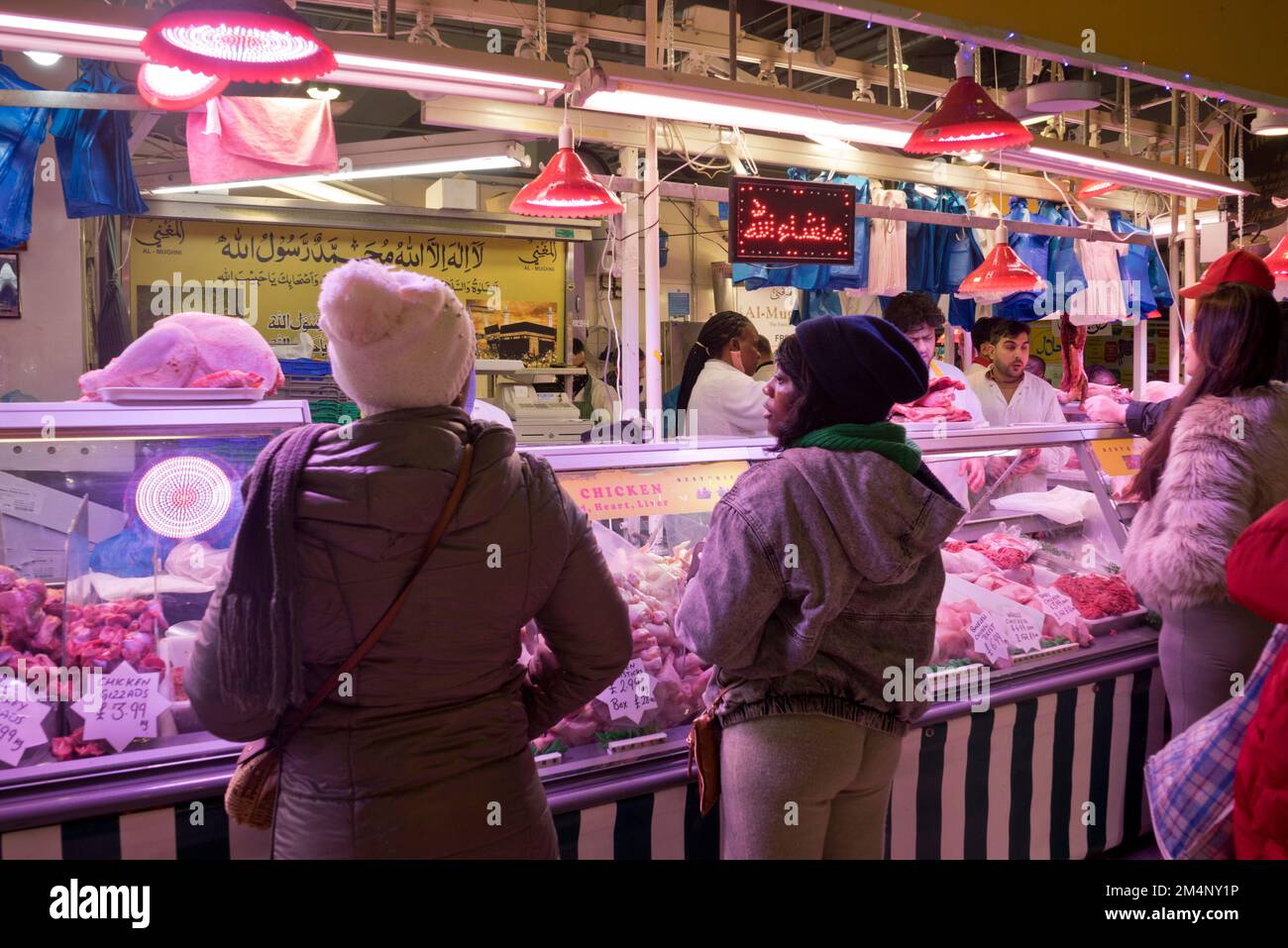 People buying meat and fish at the Bull Ring indoor markets in ...