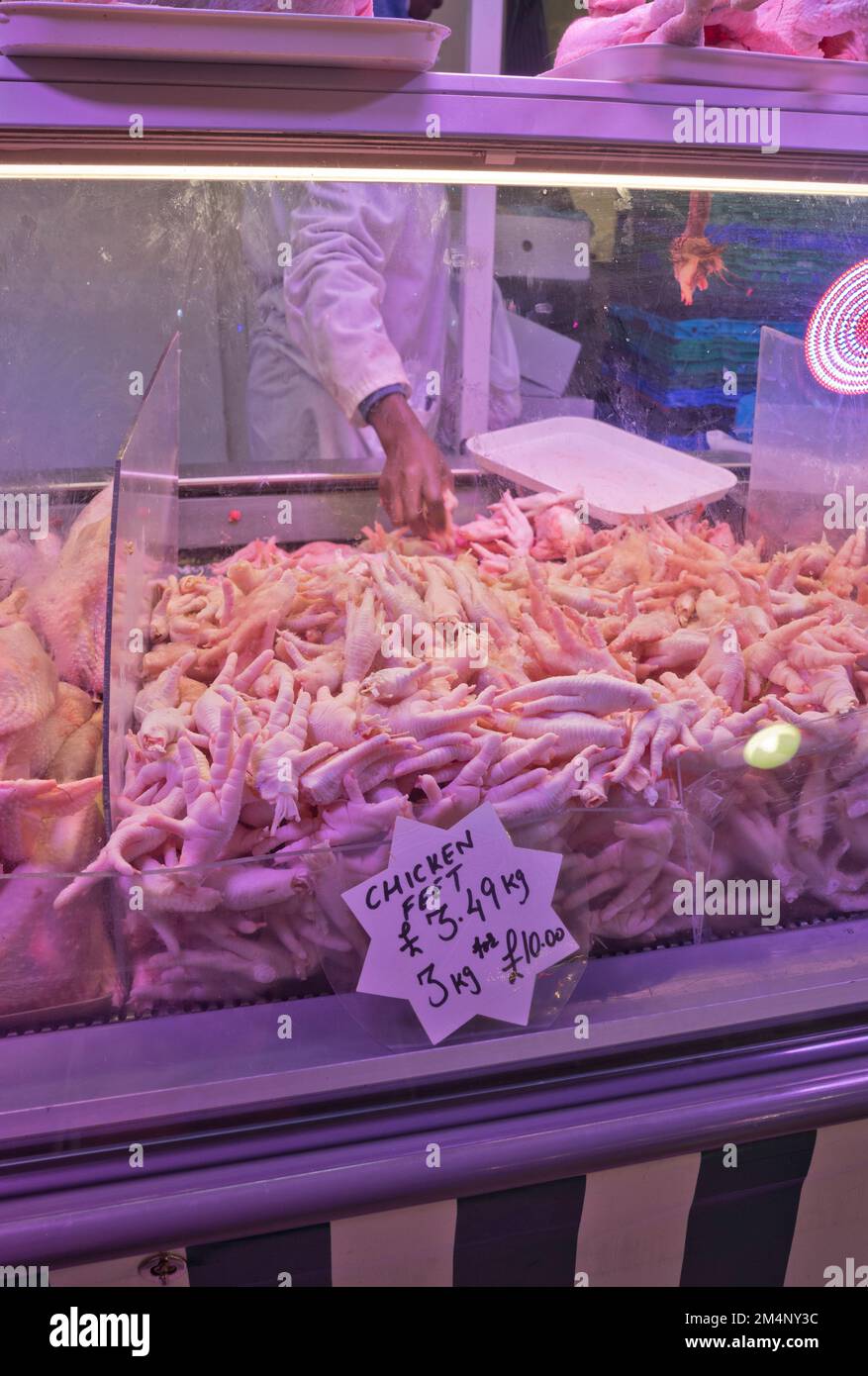 People buying meat and fish at the Bull Ring indoor markets in ...