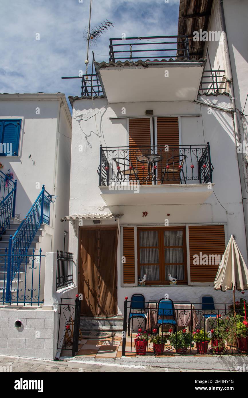 Typical narrow Greek streets and architecture with country side houses ...