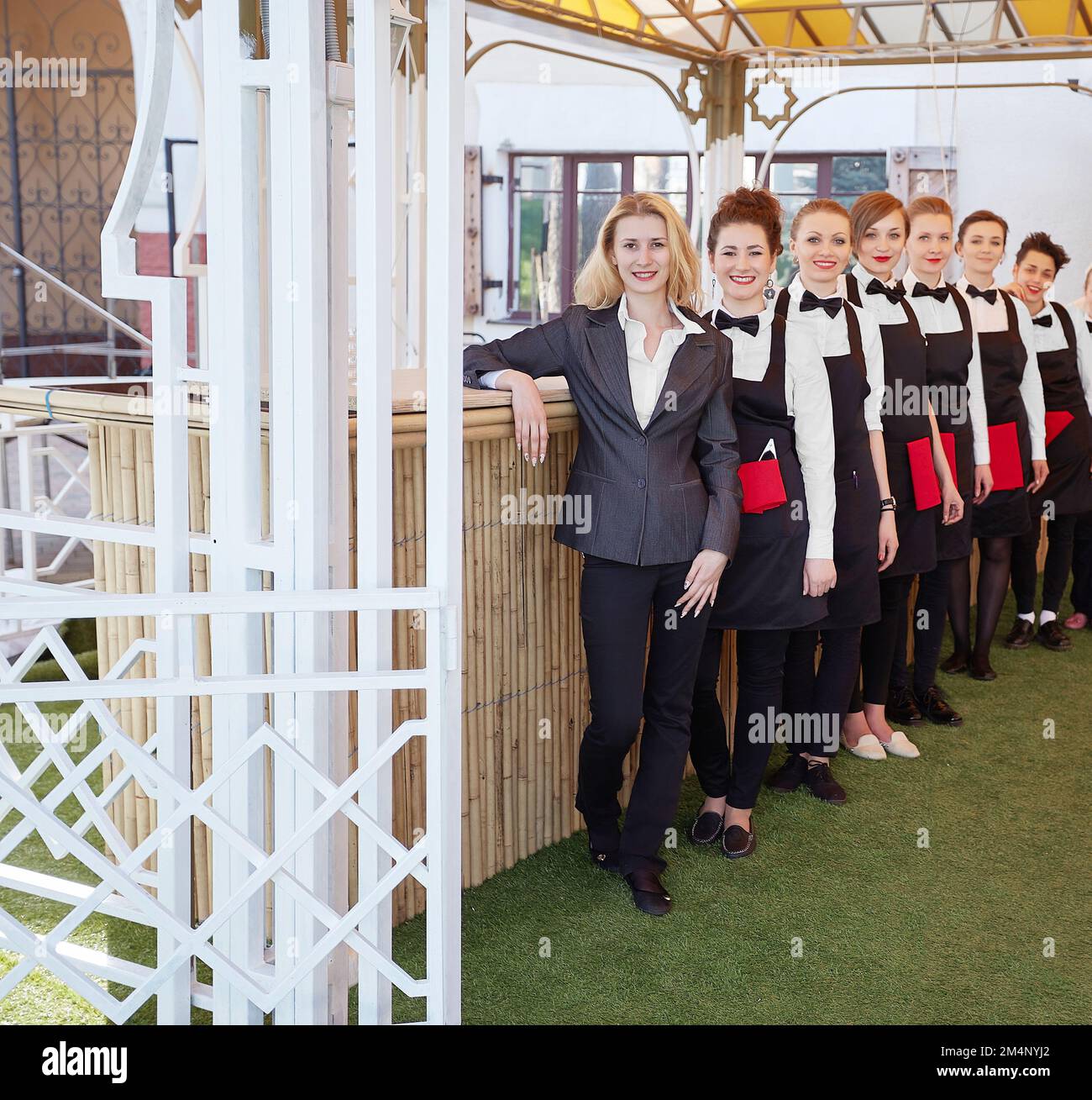 hotel staff standing in the corridor of a modern hotel Stock Photo - Alamy