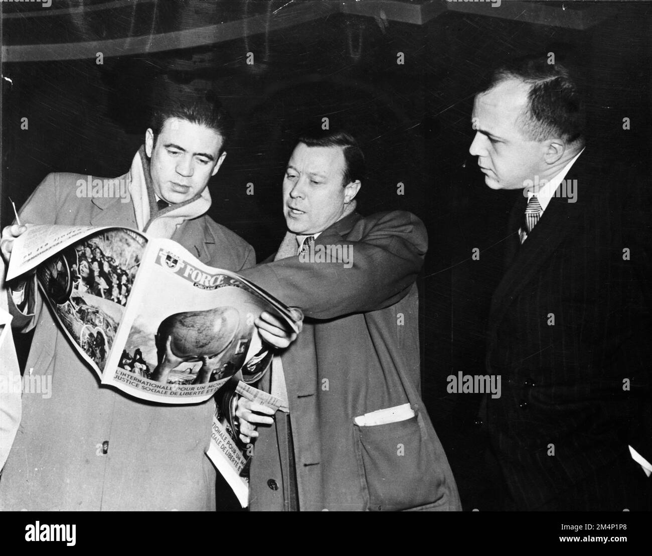 Guy Nunn and Walter Reuther Study a Special Edition of "Force Ouvriere ...