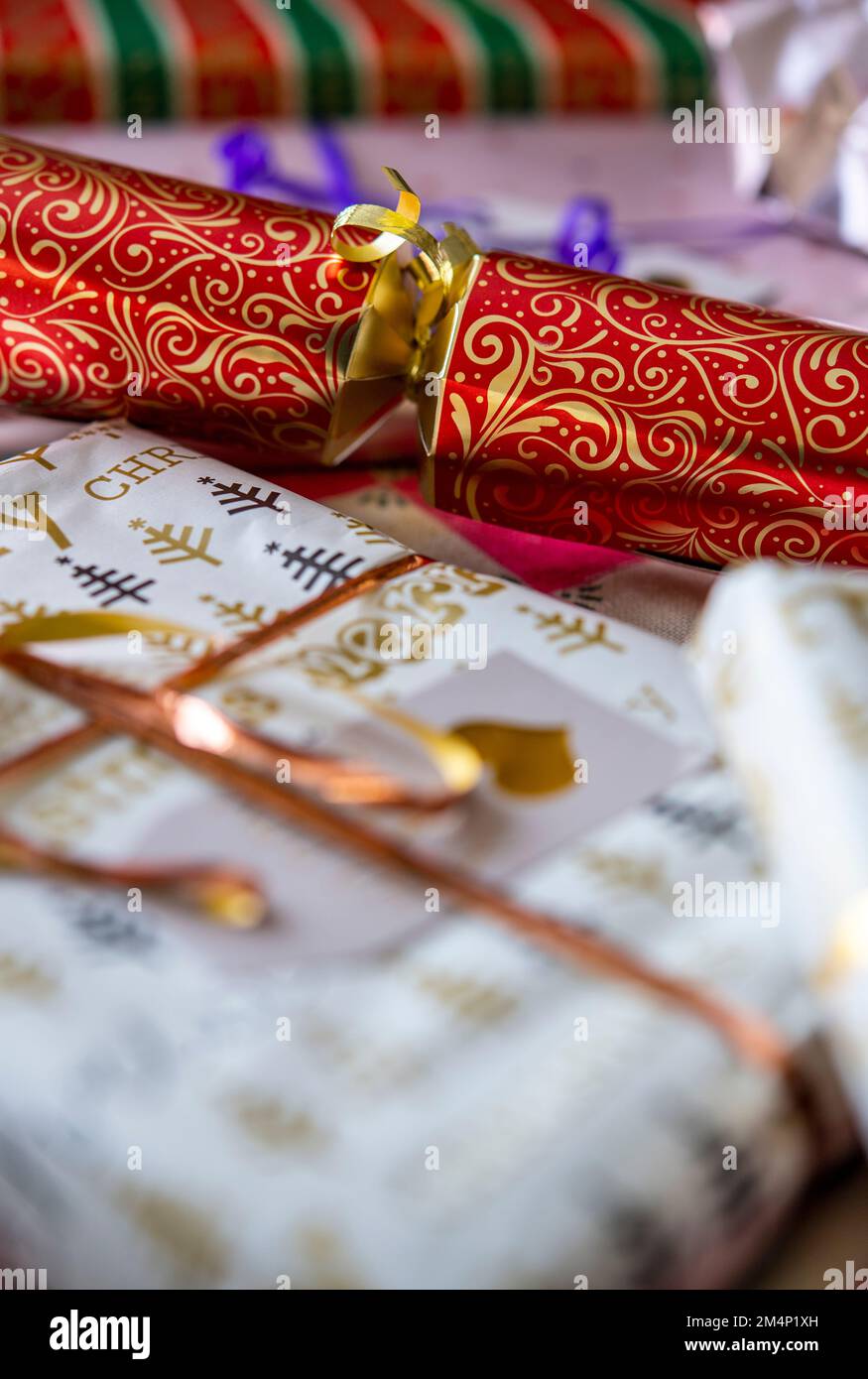 Christmas cracker and presents Stock Photo - Alamy