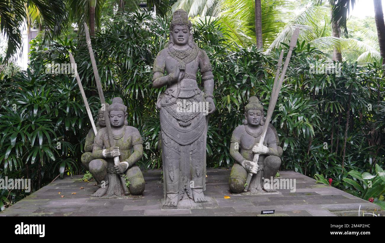 Calm quite Public park with javanese statue on Greenery environment ...