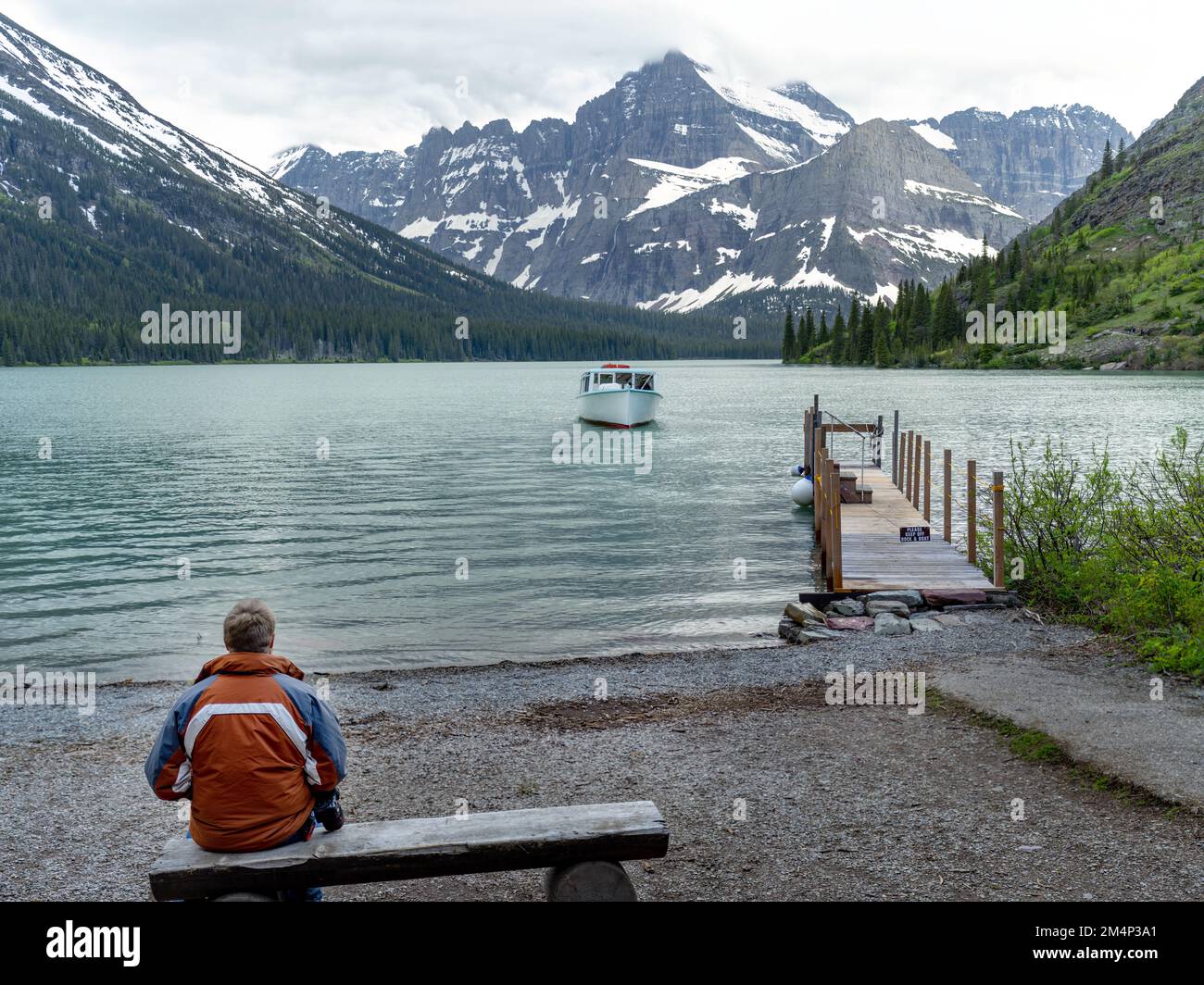 Glacier National Park boat ramp and passenger waiting Stock Photo - Alamy