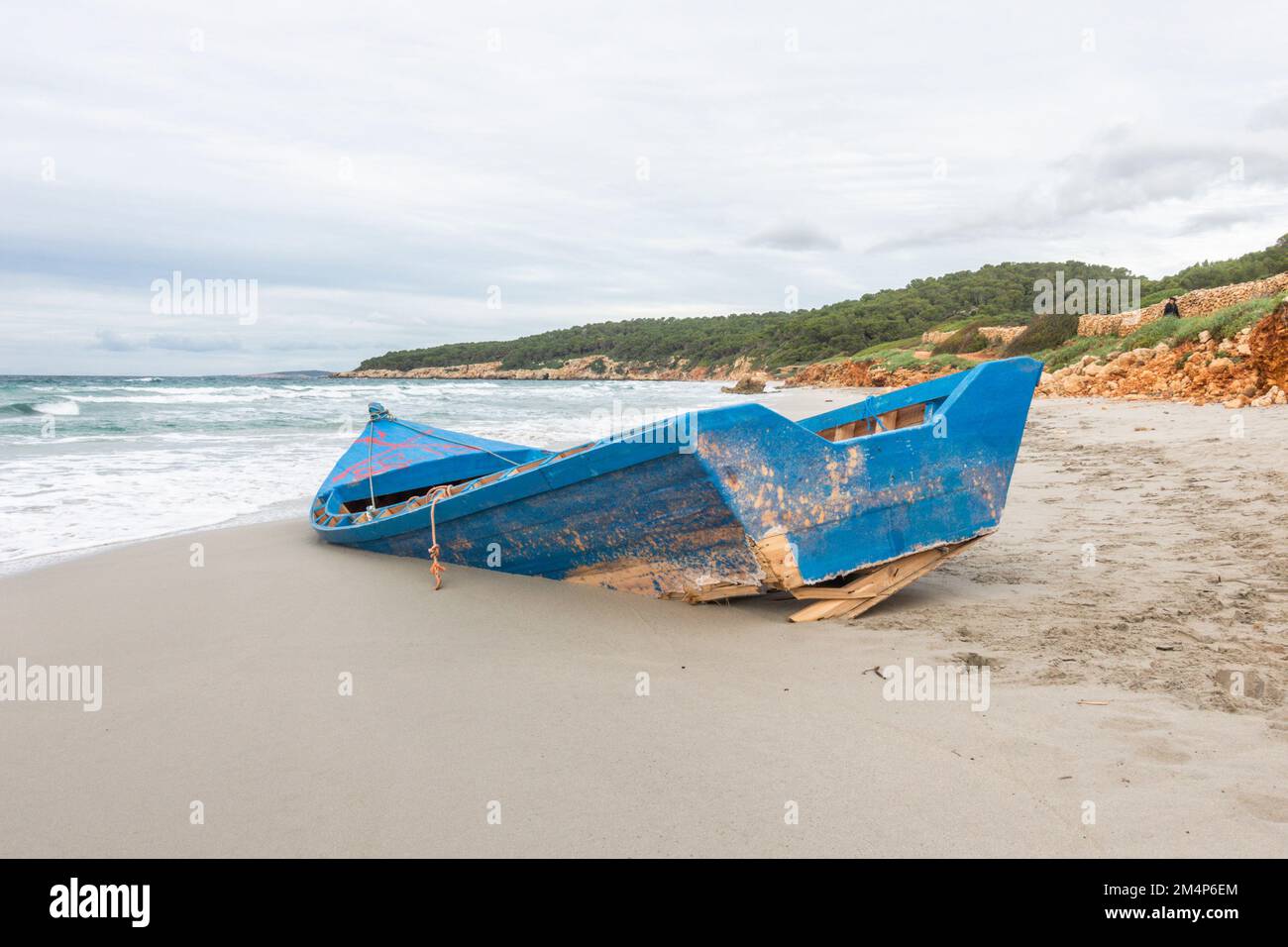 Old fishing boat stranded on beach, Bini Gaus, Menorca, Balearic ...
